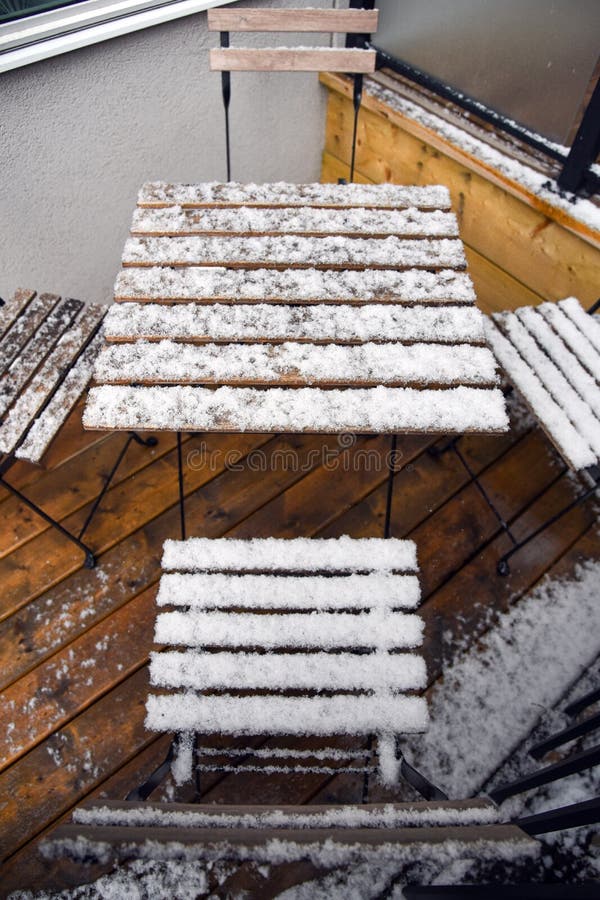 Patio set covered in snow stock image. Image of bright - 147063475