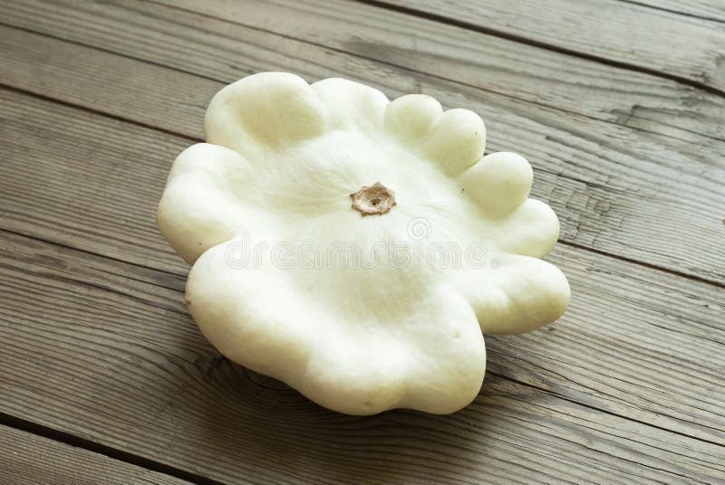 Patison on wooden table stock photo. Image of studio - 21581622