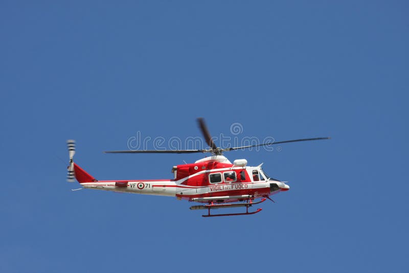 Patrol Helicopter of Firefighters in Blue Sky Over a Fire Editorial ...