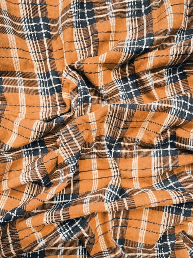 The Pattern and Background of the Fabric Has a Orange Checkered Motif ...
