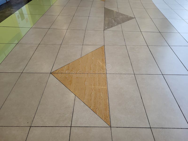 A Pattern of Beige and Grey Glossy Floor Tiles Stock Photo - Image of ...