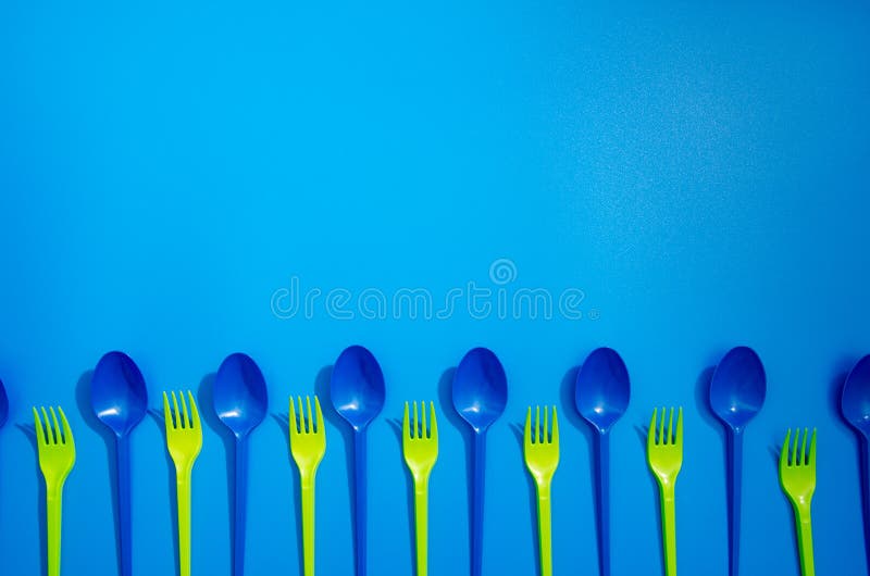 Pattern of Blue Plastic Spoons on Blue Background. Blue Color of 2020 ...