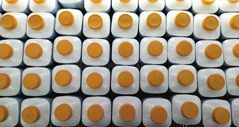 Milk Bottle with Yellow Cap Display at Supermarket, Supermarket Display ...