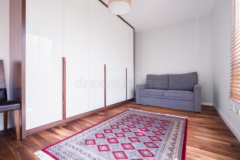 Pattern Carpet on Wooden Floor Stock Photo - Image of commode, floor ...