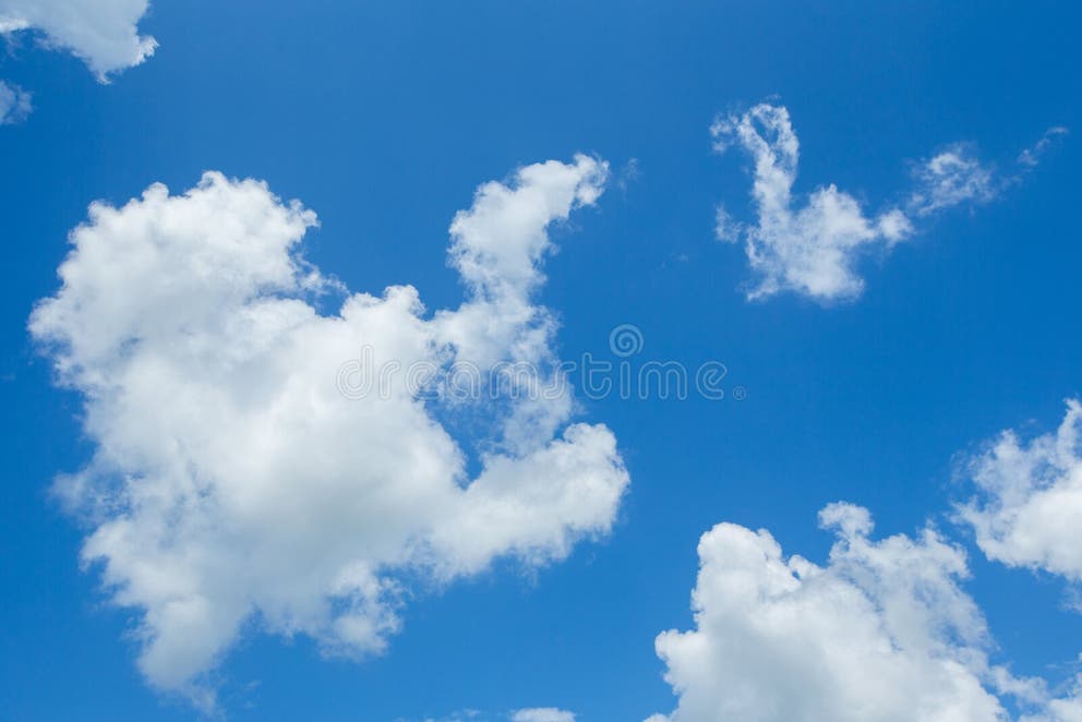The Pattern of Clouded Fluffy Rabbit. on the Blue Backdrop There Stock ...