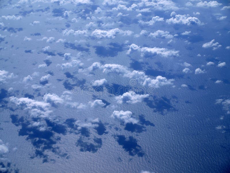 Sparse Fluffy Clouds from Above Stock Photo - Image of plane, cotton ...