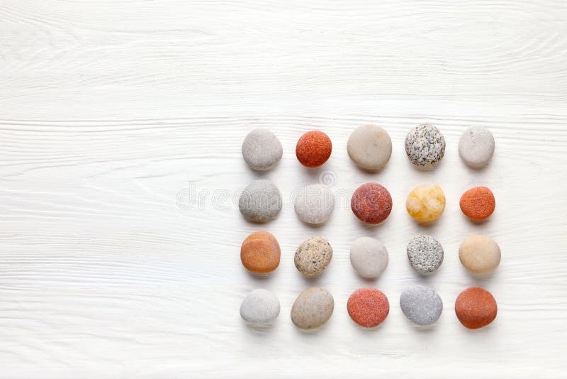 Pattern of Colored Pebbles on White Wooden Background. Flat Lay, Top ...