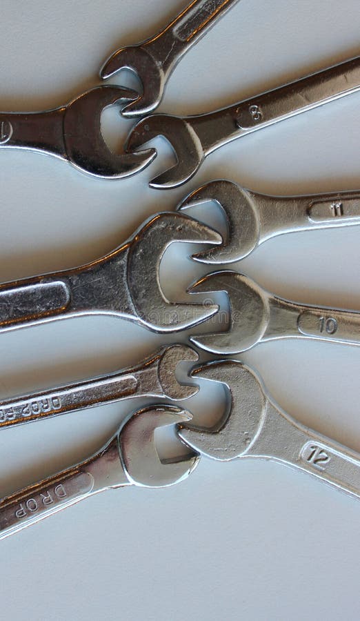 Pattern of Connected Wrench Heads of Different Sizes Vertical Image ...