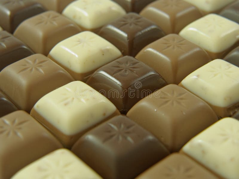 Pattern of Dark, Milk and White Chocolate Pieces Stock Photo - Image of ...