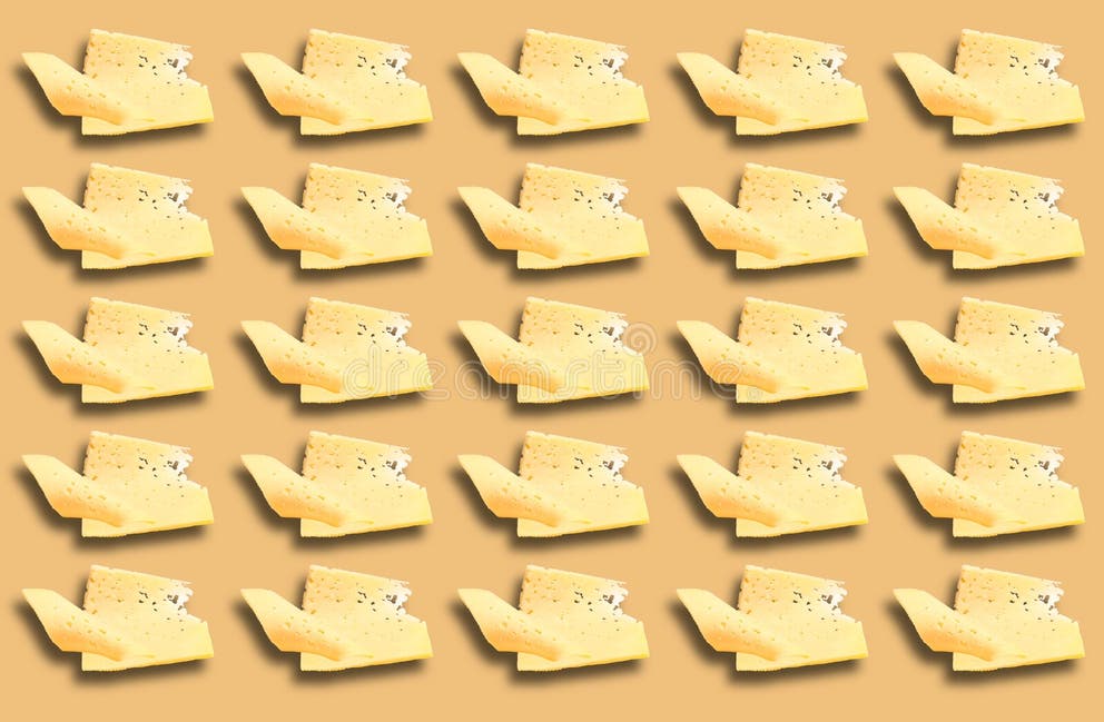 A Pattern of Different Slices of Hard Cheese with a Shadow on a Beige ...