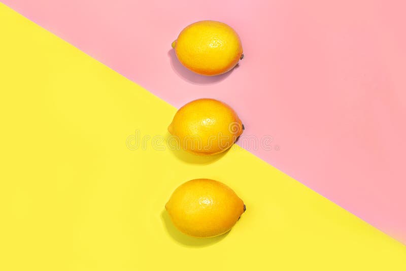 Pattern of Lemons on Yellow and Pastel Pink Background. Stock Image ...