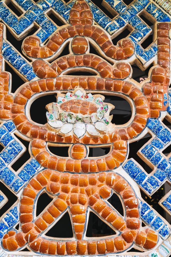 A Pattern and a Lotus Flower Made of Small Ceramic Tiles Stock Image ...