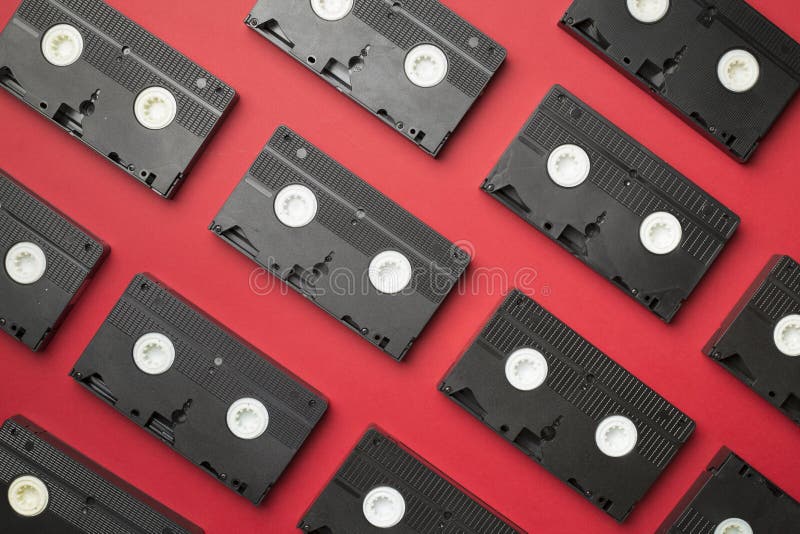 Pattern Made with Old Tape VHS Cassette on Color Background, Top View ...
