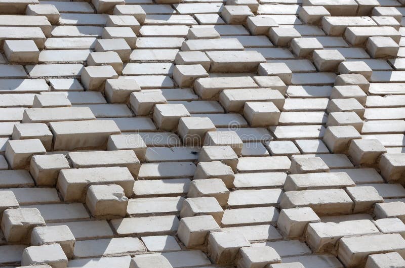 A Pattern Made of White Bricks in the Form of Diamond Shapes. De Stock ...