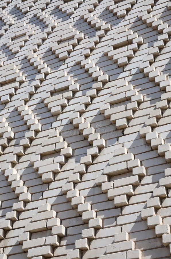 A Pattern Made of White Bricks in the Form of Diamond Shapes. De Stock ...