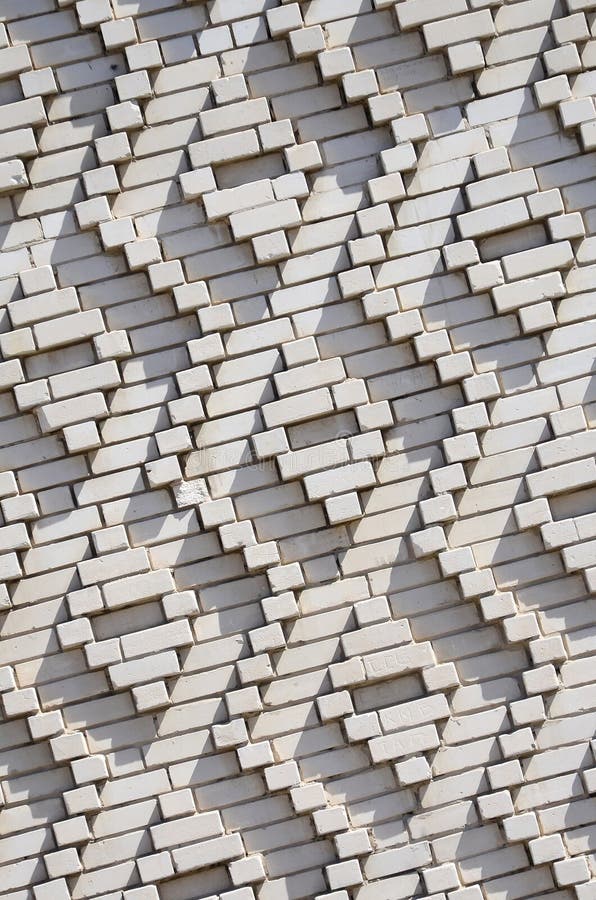 A Pattern Made of White Bricks in the Form of Diamond Shapes. De Stock ...