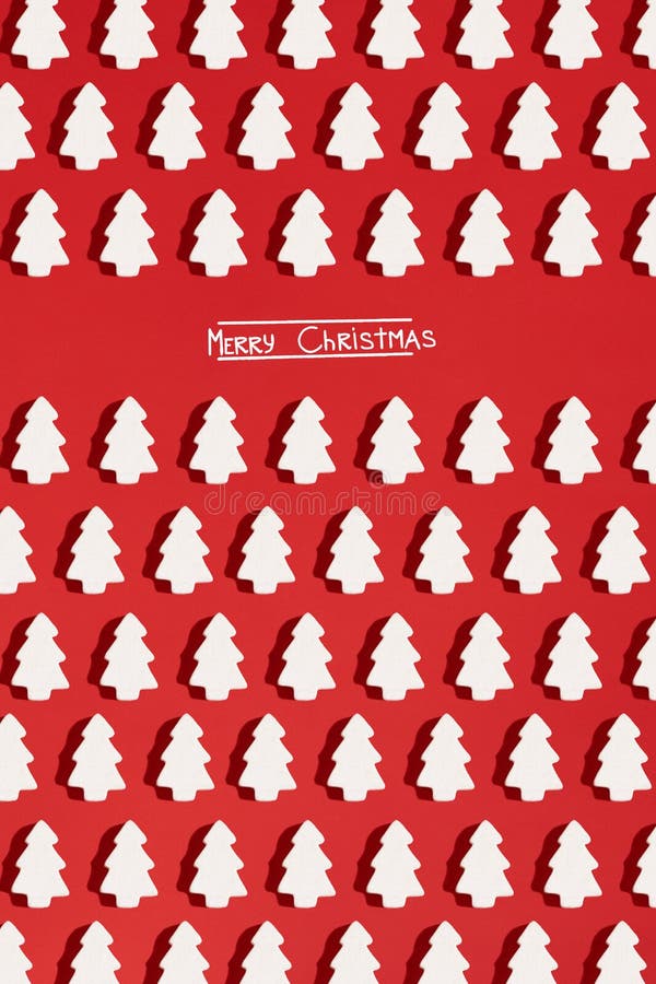 Pattern Made of White Christmas Decoration with Christmas Tree on Red ...