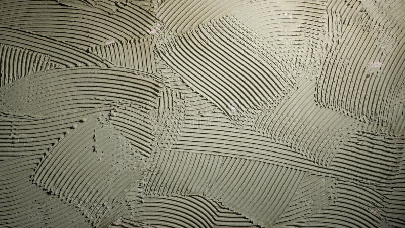 Pattern of Notched Trowel Strokes on the Gray Surface of Cement Putty ...