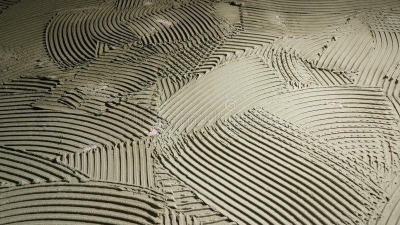 Pattern of Notched Trowel Strokes on the Gray Surface of Cement Putty ...