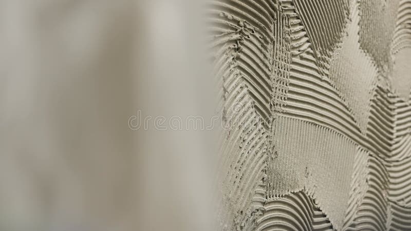 Pattern of Notched Trowel Strokes on the Gray Surface of Cement Putty ...