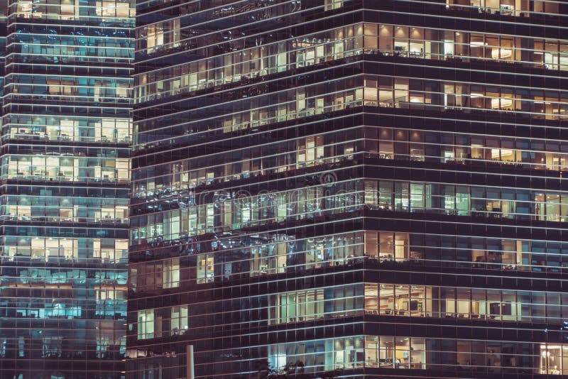 Pattern of Office Buildings Windows Illuminated at Night. Lighting with ...