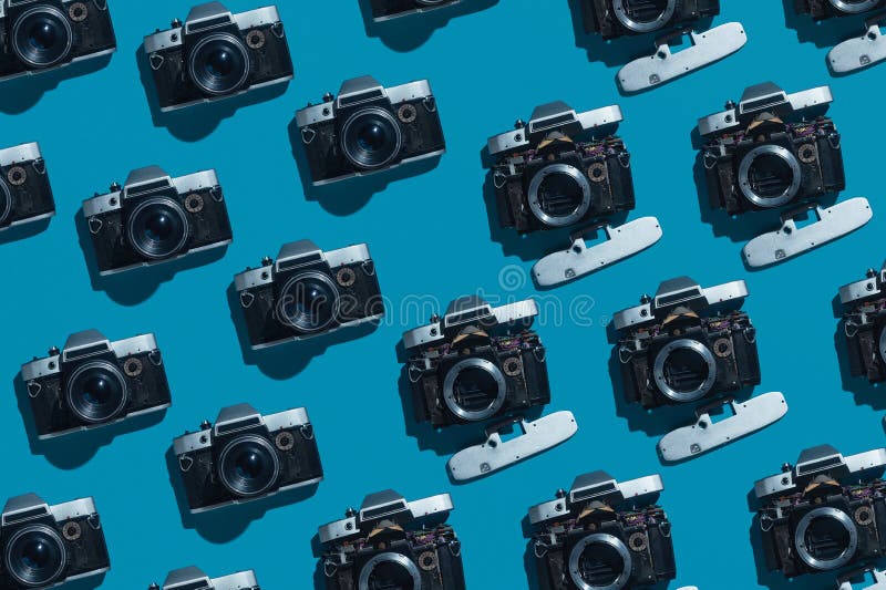 Pattern of Old Rustic Vintage Film Cameras on Blue Stock Photo - Image ...