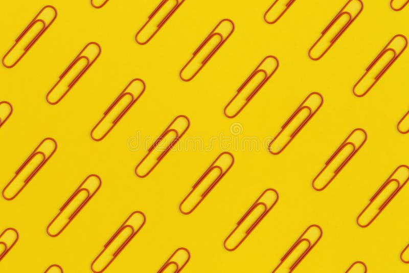 Pattern of Red Paper Clips on Yellow Background. Top View. Flat Lay ...
