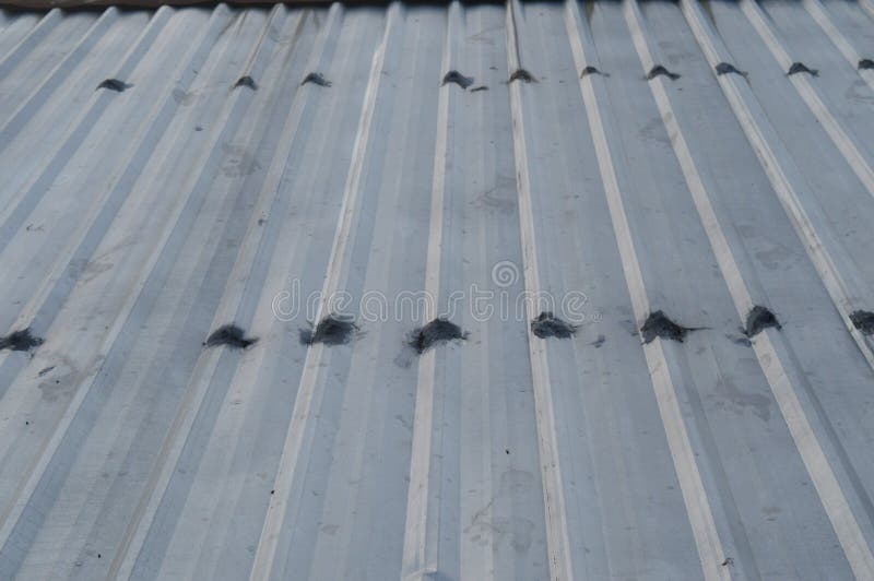 The Pattern and Shape of the Tin Roof of a House Stock Photo - Image of ...