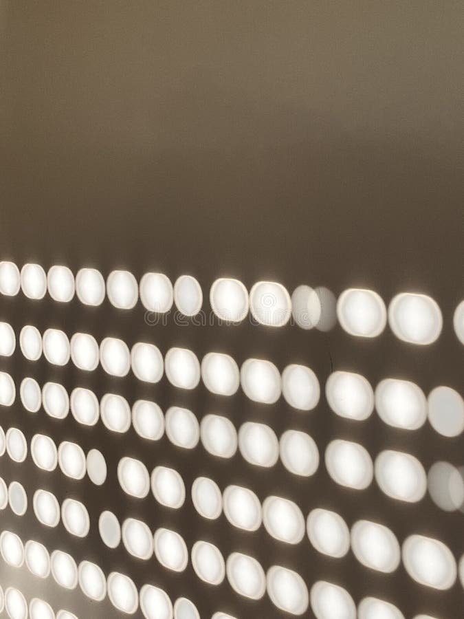 Pattern of a Sheet Metal with Holes Illuminated from Behind Stock Photo ...