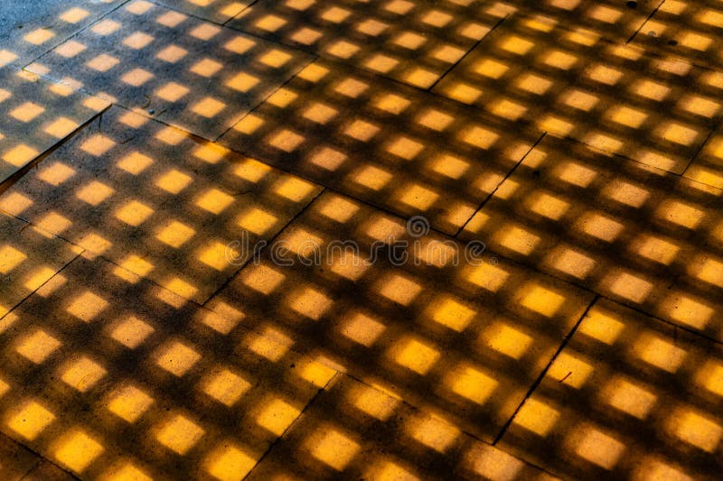 A Pattern of Squares on a Floor, with the Squares Being a Mix of Yellow ...