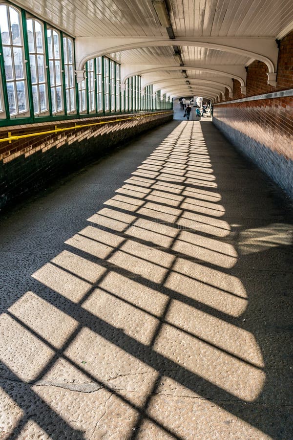 Pattern of Window Shadows on a Long Footpath Stock Image - Image of ...