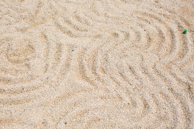 A Pattern on the Yellow Sand of a Round Shape on the Shore Stock Image ...