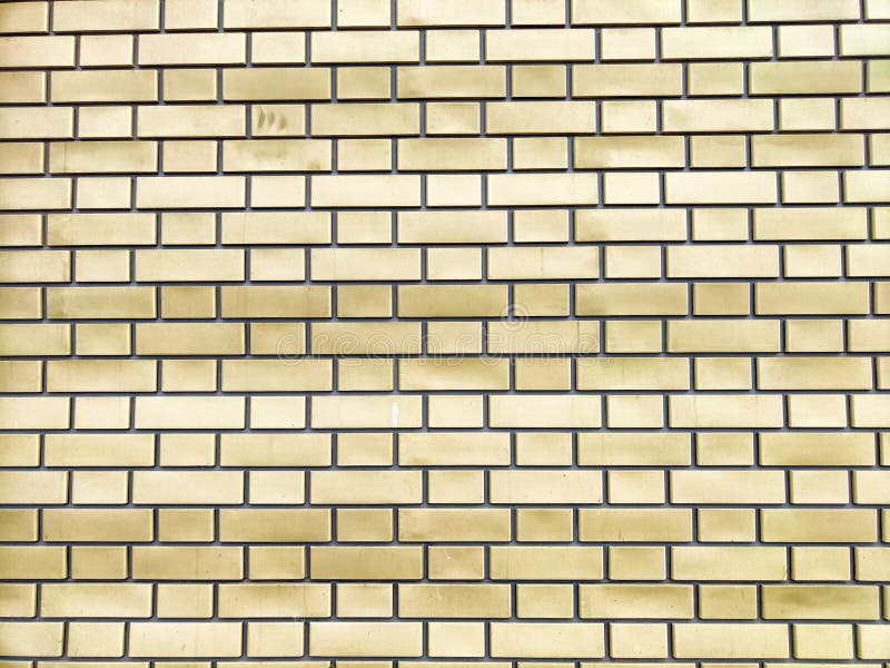 Patterned Brick Wall with Alternating Light and Dark Bricks in a ...