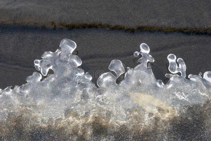 The Patterned Edge of Ice Near the Water Stock Image - Image of icicle ...