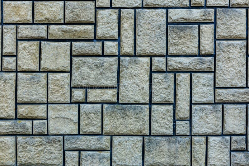 Patterned Stone Wall with Rectangular Blocks and Blue Mortar Stock ...