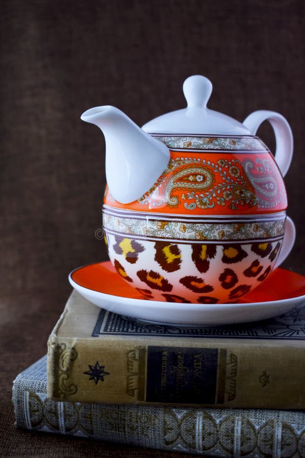 Teapot stock photo. Image of light, teapot, brown, books - 101535958