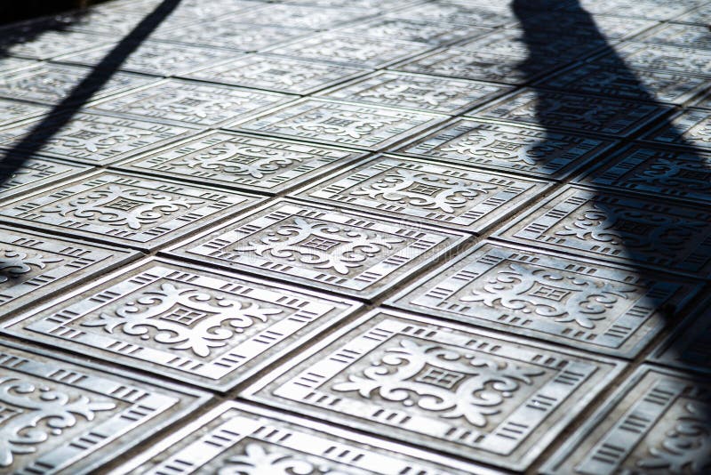 Patterns on Large Metal Floor Plates on a Street of City Stock Image ...