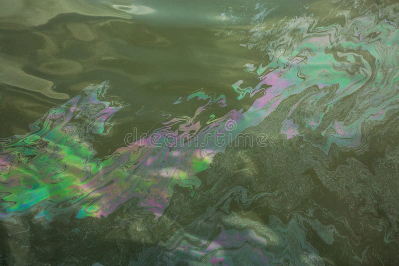 Patterns of Oil Stains on the Water Surface. Stock Image - Image of ...