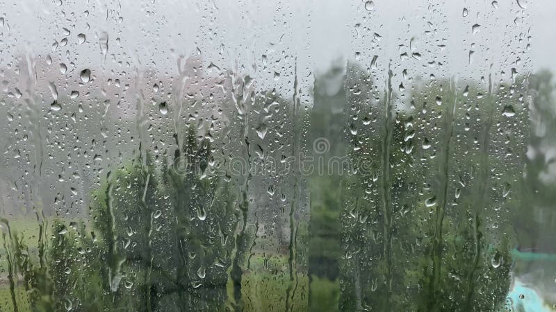Rainfall Hitting a Window stock video. Video of variety - 231673623