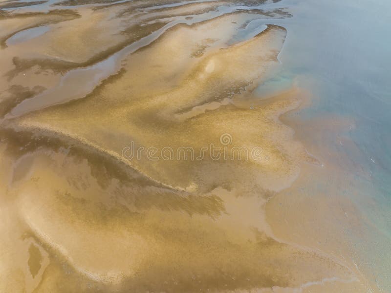 Patterns in the Sand at Low Tide Stock Photo - Image of beach, exposed ...