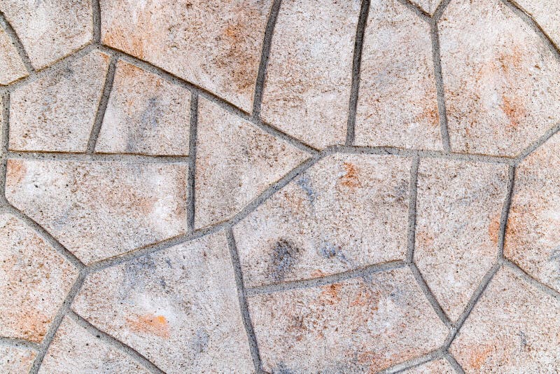 Patterns on a stone wall stock photo. Image of small - 339870830