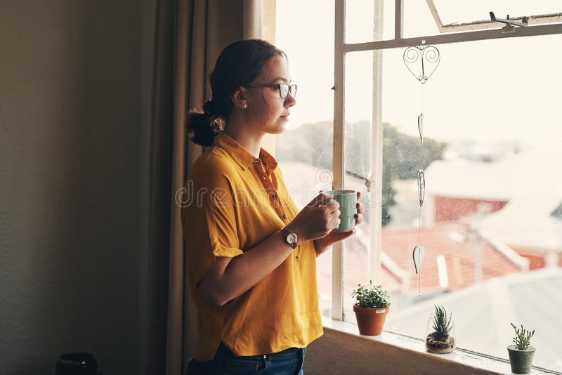 A Pause Puts it into Perspective. a Young Woman Having Coffee and ...