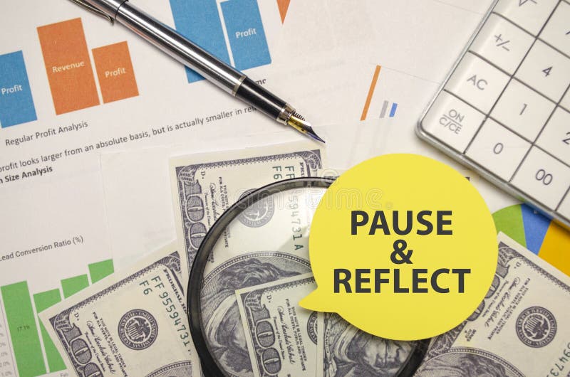 PAUSE and REFLECT on Yellow Sticker with Pen and Calculator Stock Photo ...