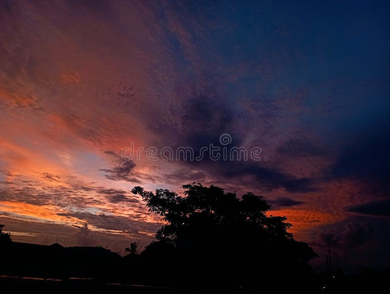 Pausing after Work To Enjoy the Change from Afternoon To Night. Stock ...