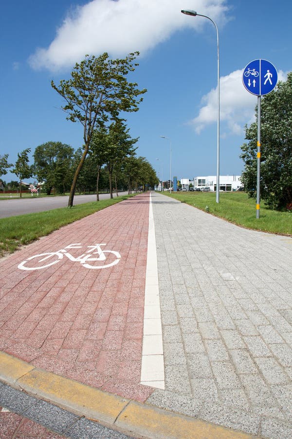 Red paved bike path stock photo. Image of paint, sidewalk - 224228194