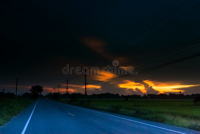 Paved Country Road with Surprisingly Beautiful Sky at Sunset. Stock ...