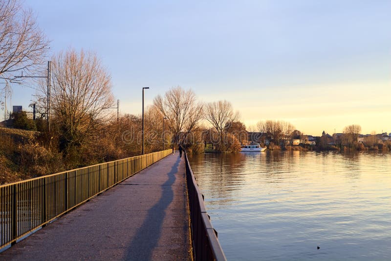 Paved Footbridge in a Park Over a Lake at Sunset Stock Image - Image of ...
