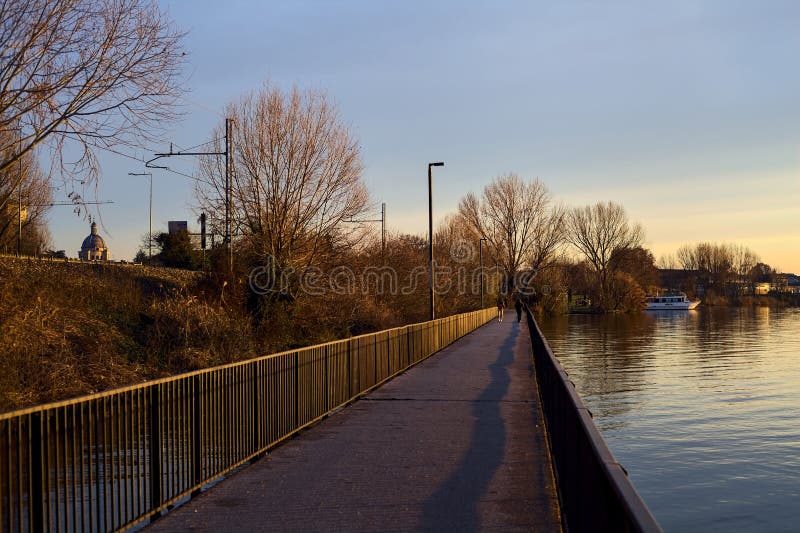Paved Footbridge in a Park Over a Lake at Sunset Stock Image - Image of ...
