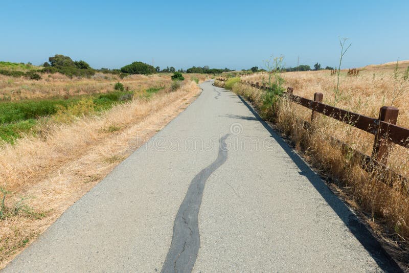 Paved pedestrian trail stock photo. Image of hill, valley - 97508936