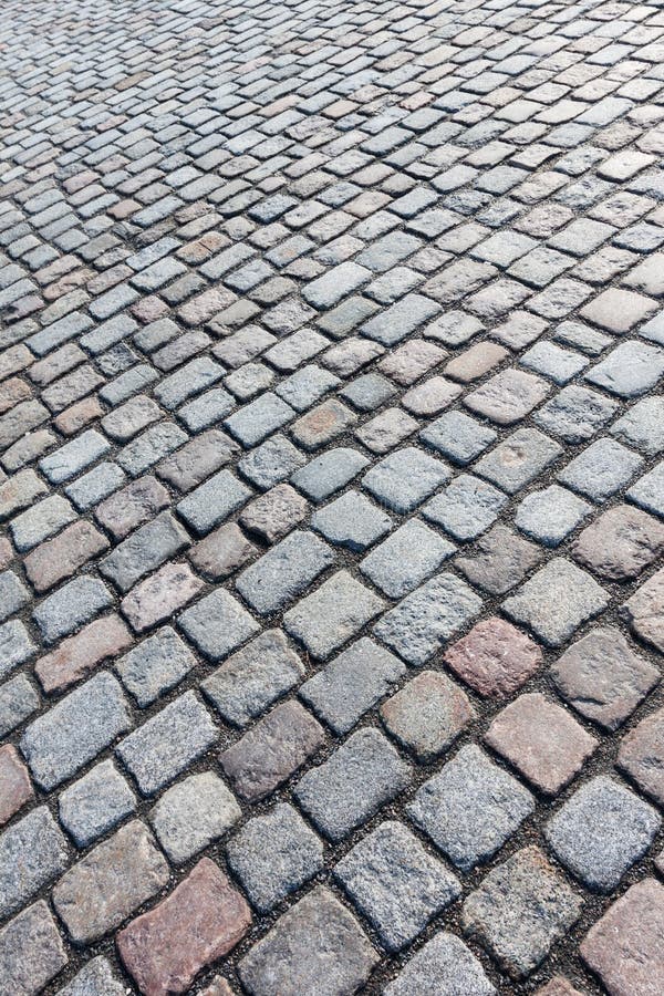 Paved road with stones stock photo. Image of material - 24433576